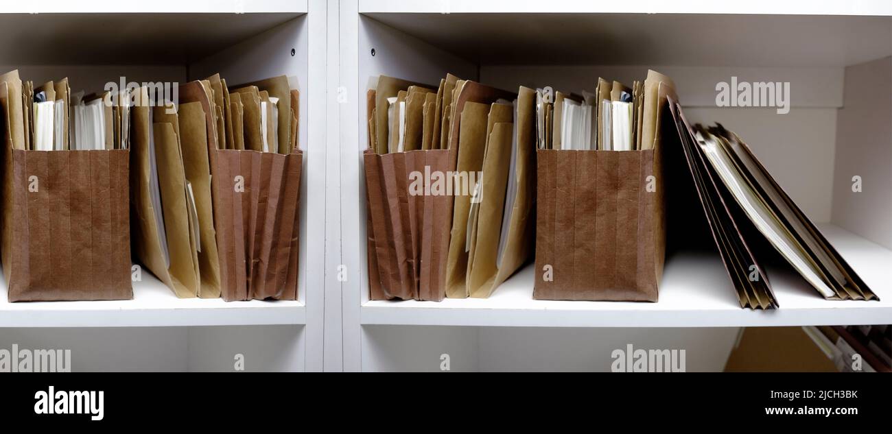 Business files in boxes folders and shelf papers Stock Photo - Alamy