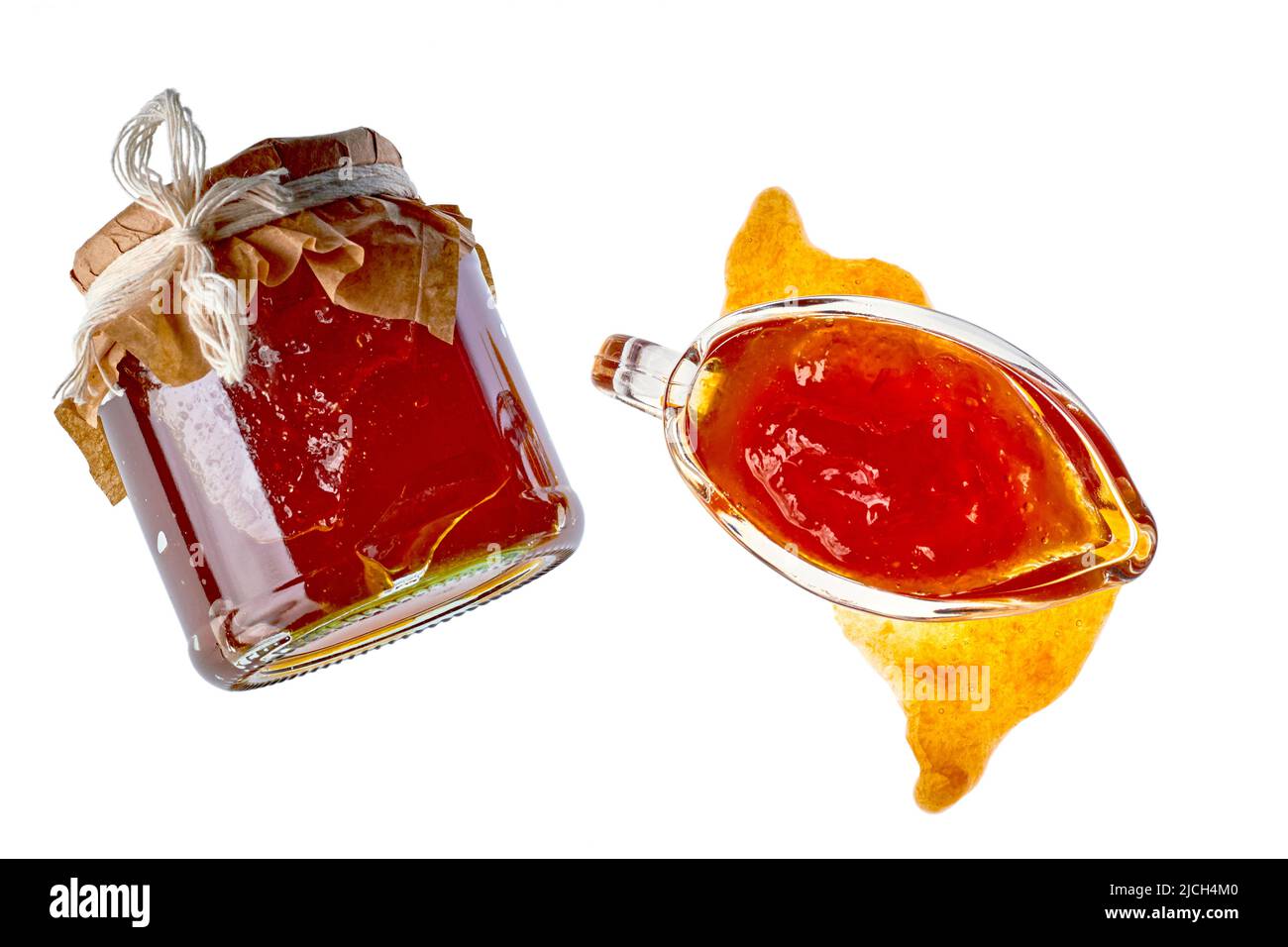 Orange color sweet fruit jam in glass bowl and jar isolated on white ...