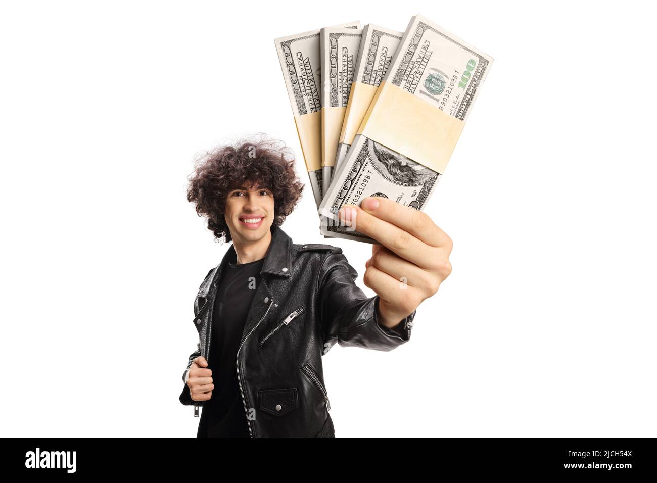 Cheerful guy in a leather jacket holding us dollar banknotes isolated ...