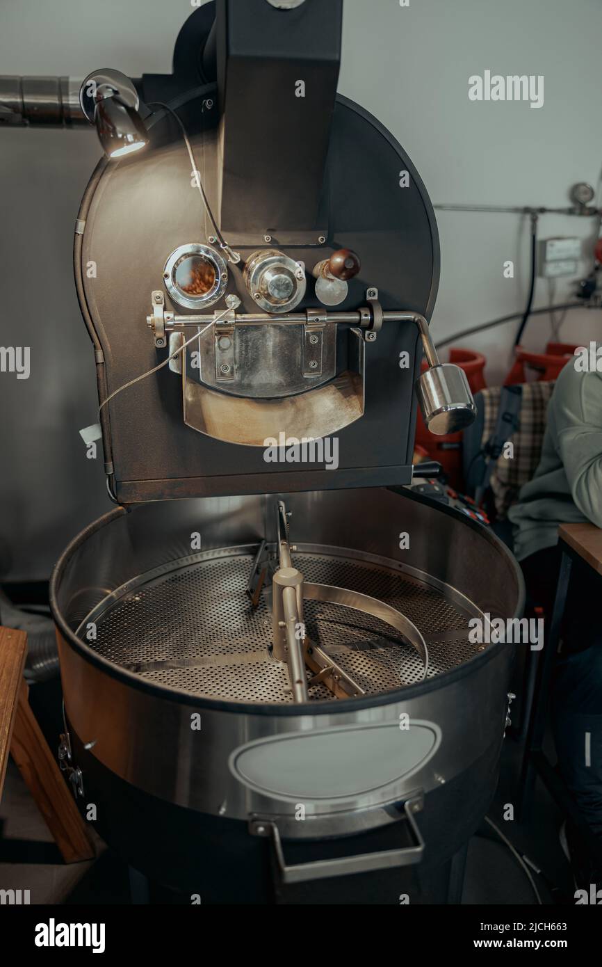 Coffee roasting machine in small coffee manufacturing Stock Photo - Alamy