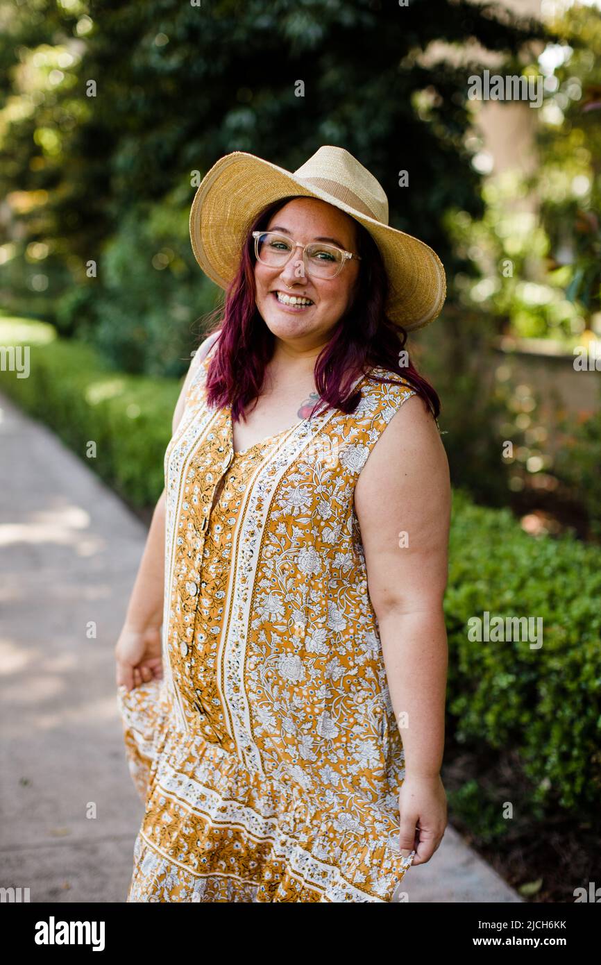 Woman Modeling Straw Hat & Dress in San Diego Stock Photo - Alamy