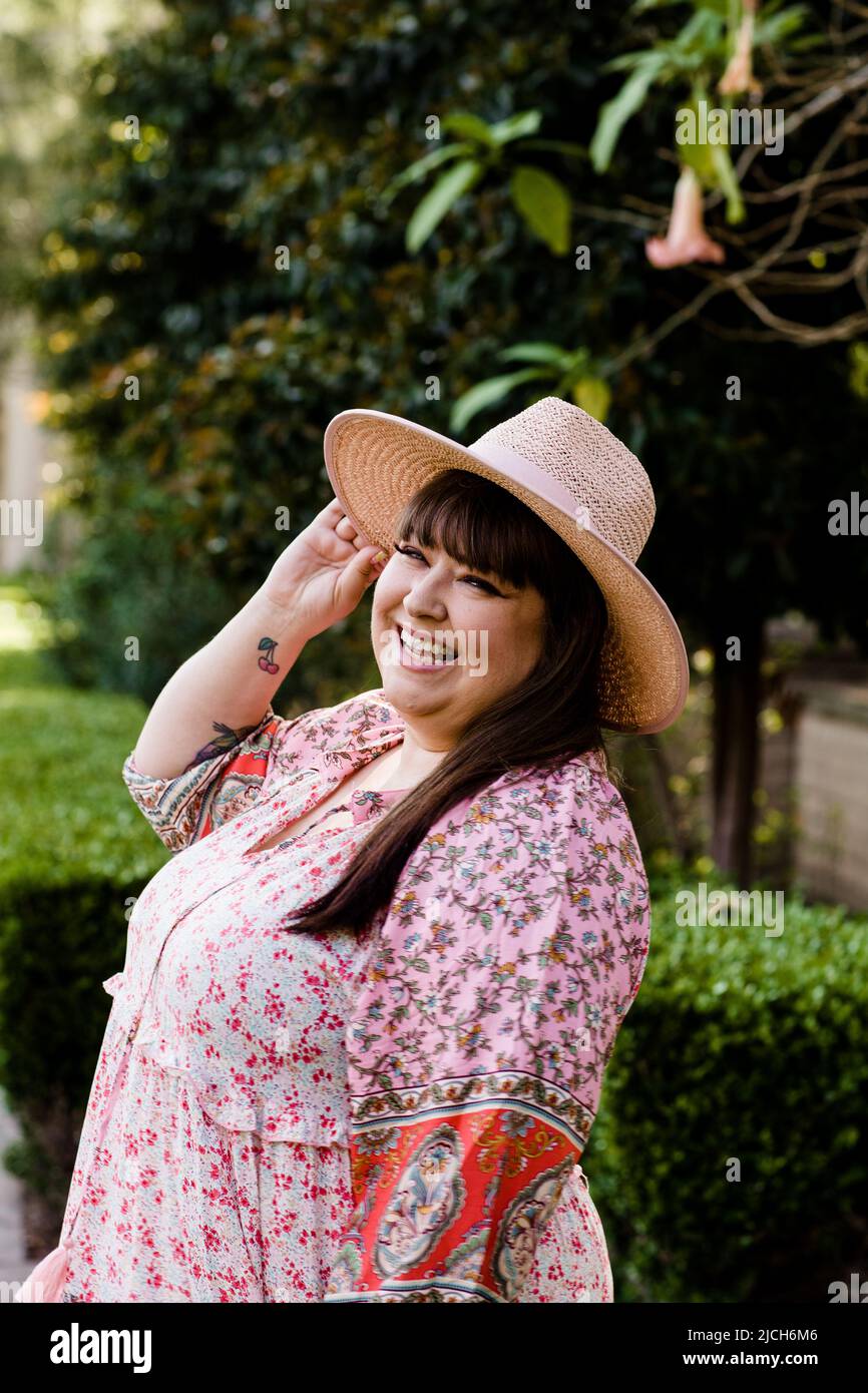 Plus Size Model Wearing Hat & Dress in San Diego Stock Photo - Alamy