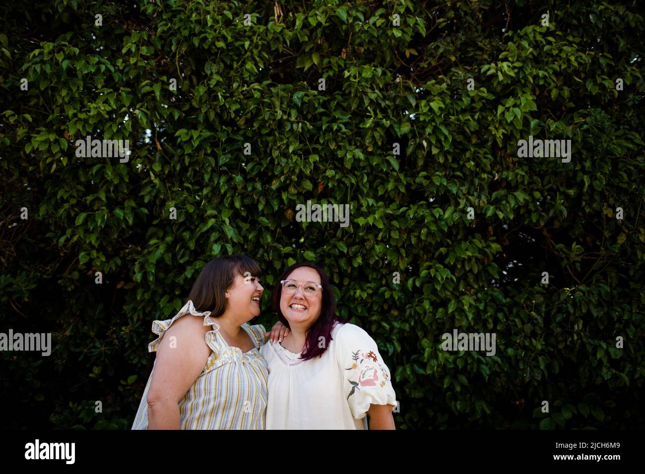 Size Inclusive Models Wearing Blouses in San Diego Stock Photo - Alamy