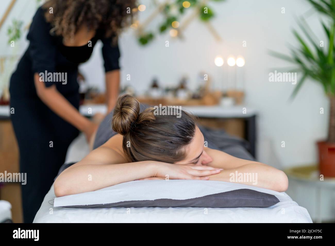 Professional woman masseur doing massage hi-res stock photography and ...