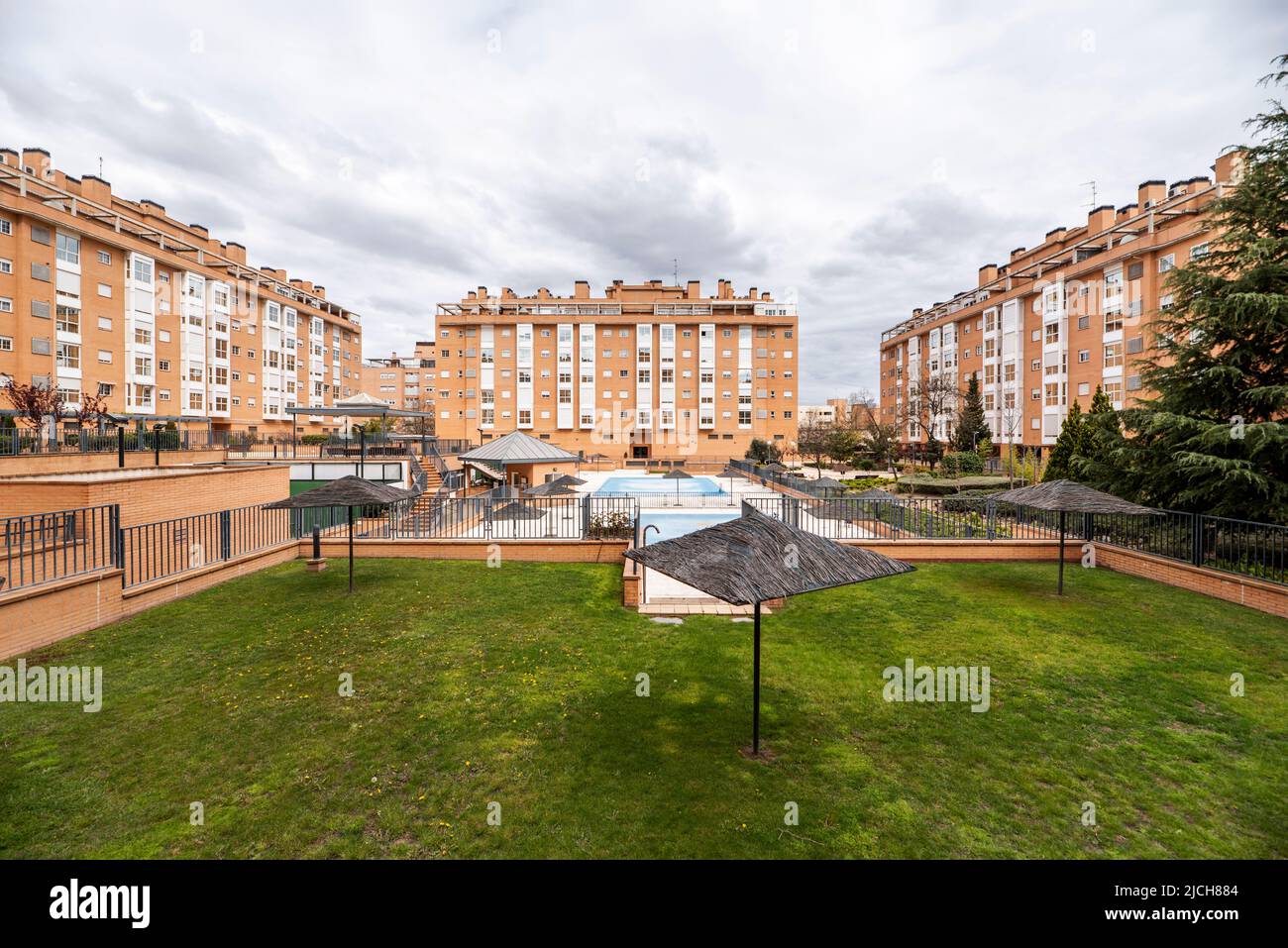 Common areas with swimming pools and gardens in an urbanization of ...