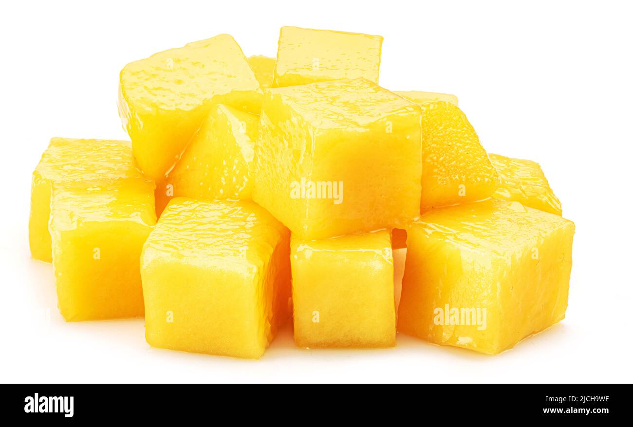 Juicy mango cubes isolated on white background Stock Photo - Alamy