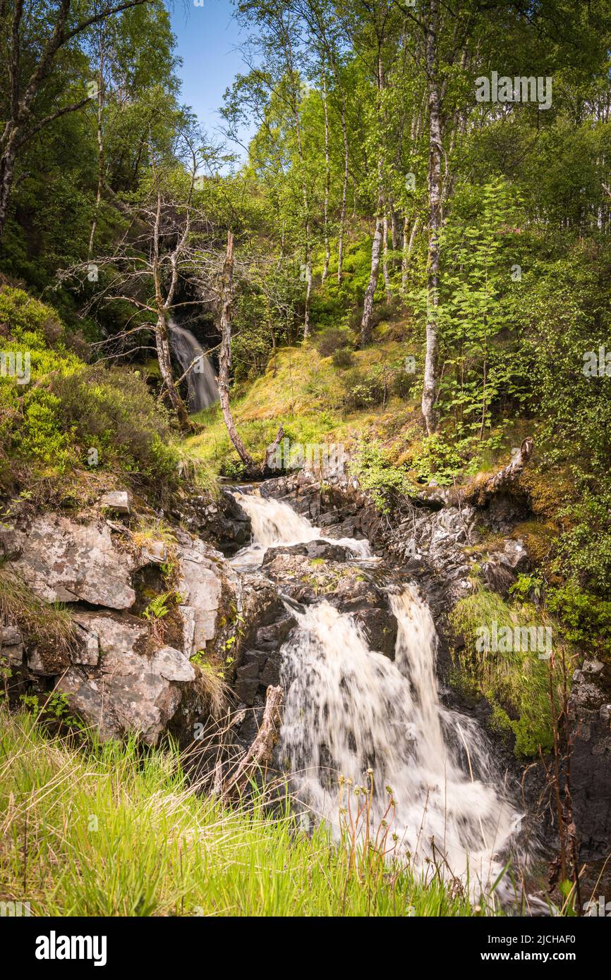 A bright, summer HDR image of Allt na h-annaite, a waterfall along ...