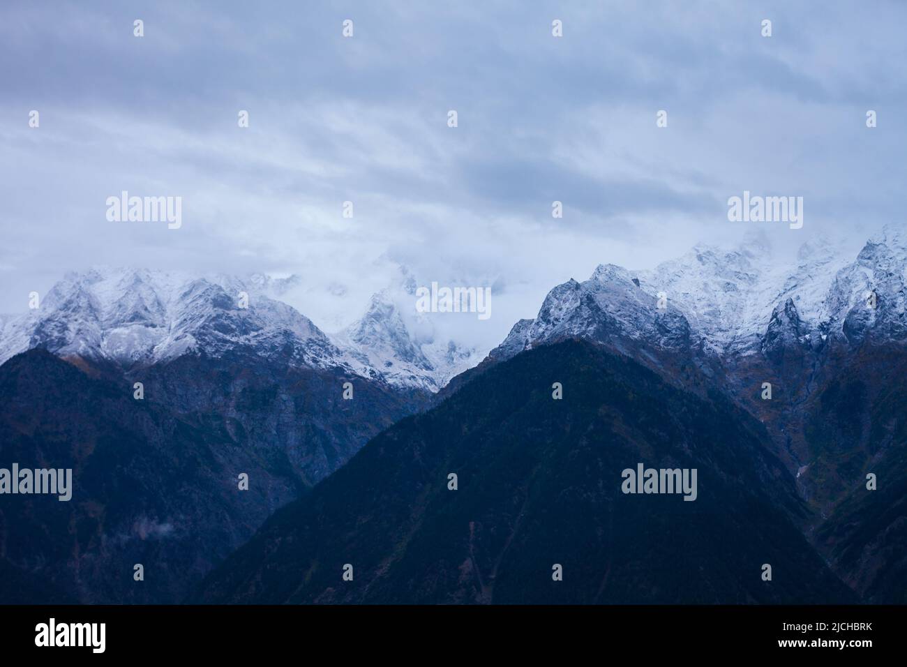 Kinnaur Kailash mountain aerial panoramic view from Kalpa. Kalpa is a ...