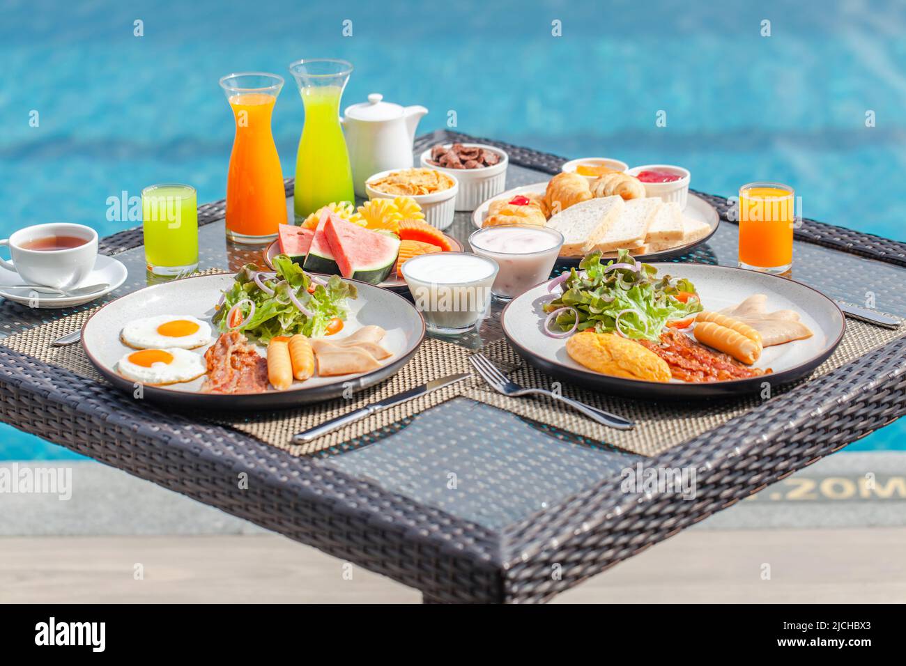 Delicious breakfast in luxury hotel. Vacation in resort by water in ...