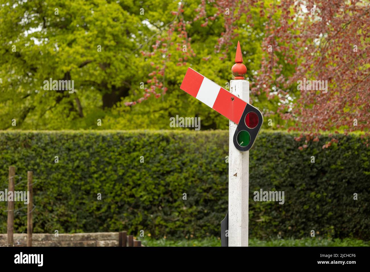 Historic red home British railway signal Stock Photo - Alamy