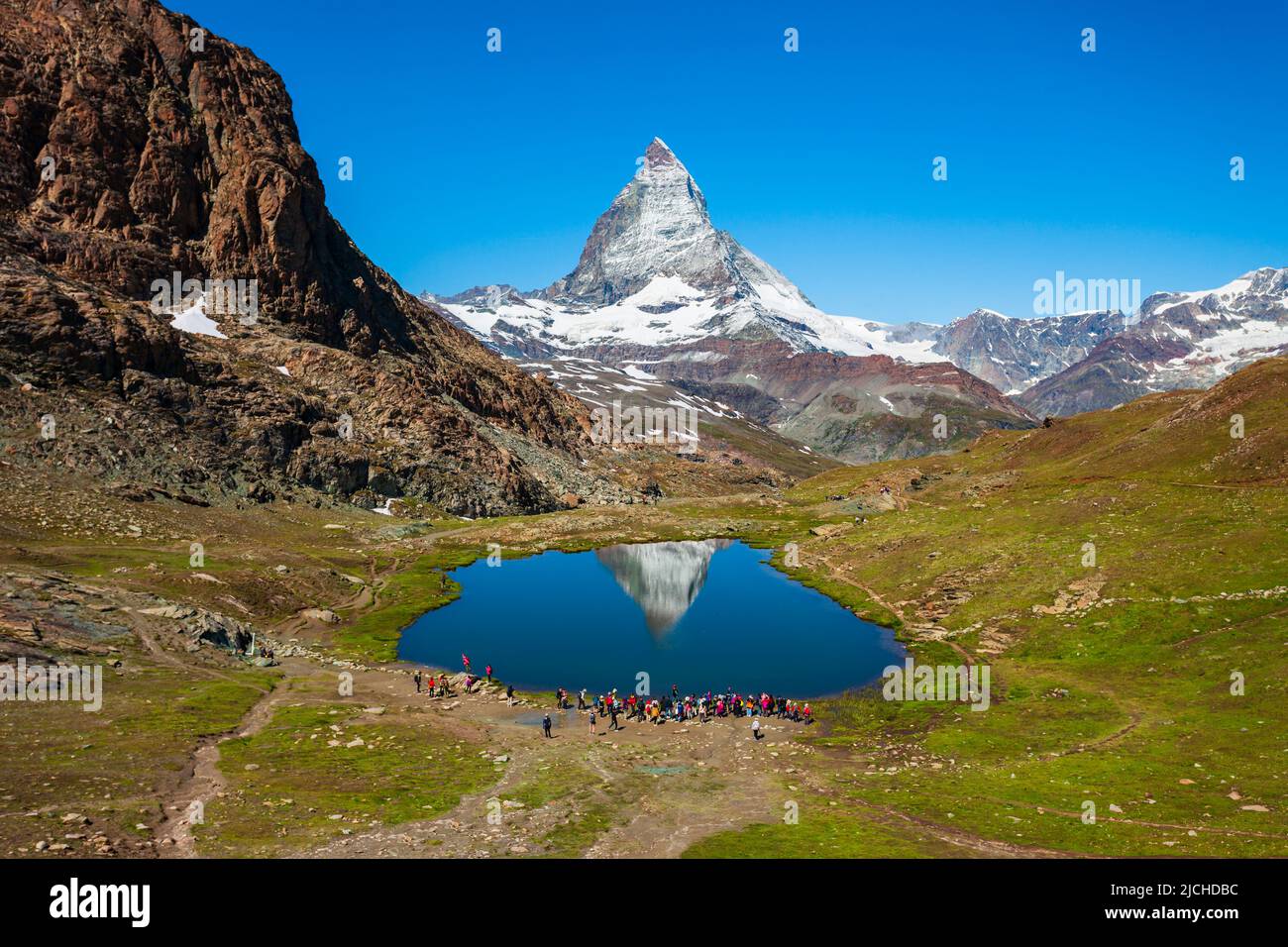 Riffelsee lake and Matterhorn mountain in the Alps, located between ...