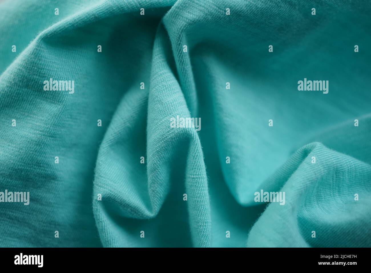 Wrinkled blue jersey, soft fabric background Stock Photo - Alamy