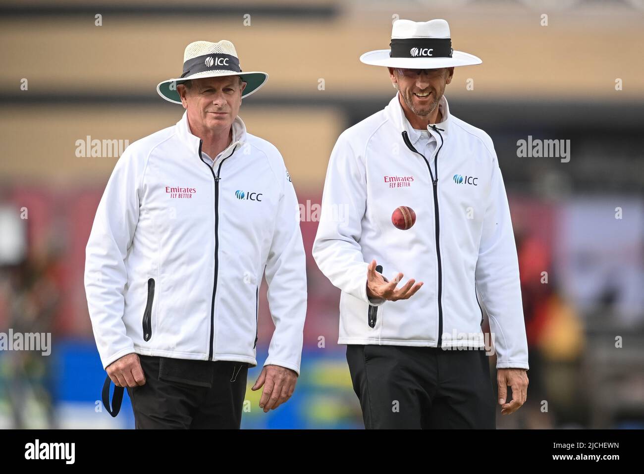 Umpire Paul Reiffel (L) and umpire Michael Gough leave the field after ...