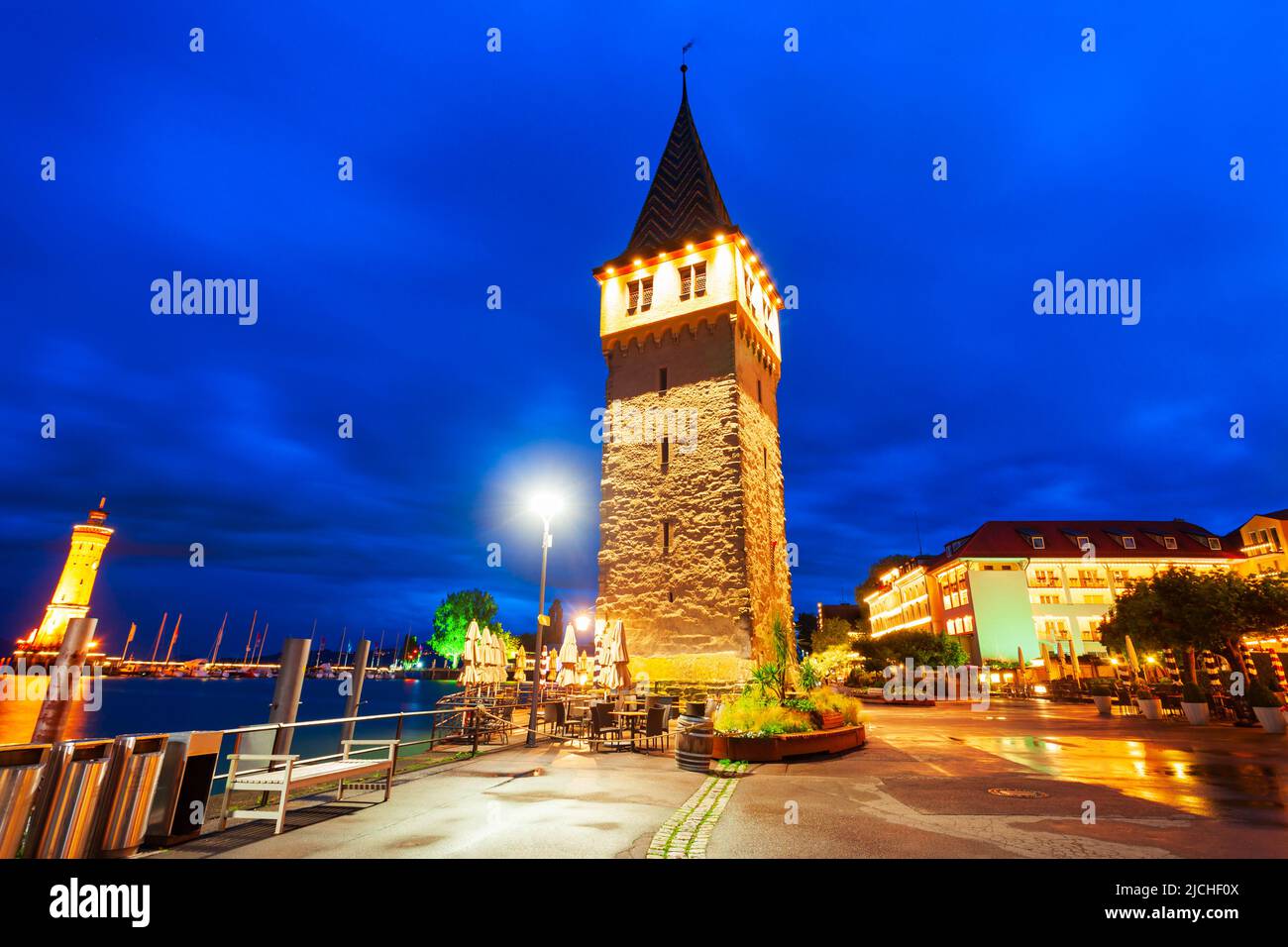 Mangturm or Mangenturm is an ancient tower in Lindau old town at night ...
