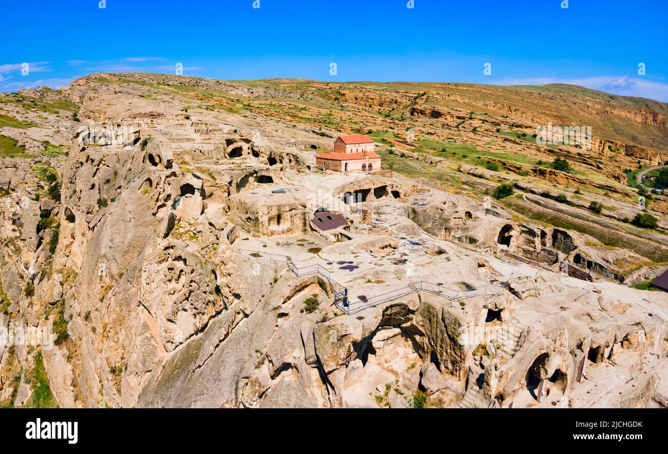 Uplistsikhe aerial panoramic view. Uplistsikhe is an ancient rock hewn ...