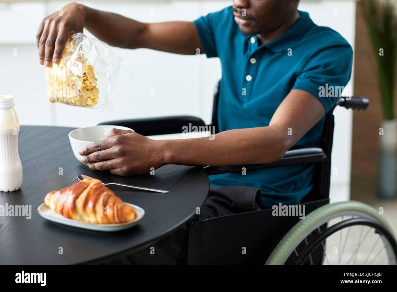African man eating cereal hi-res stock photography and images - Alamy