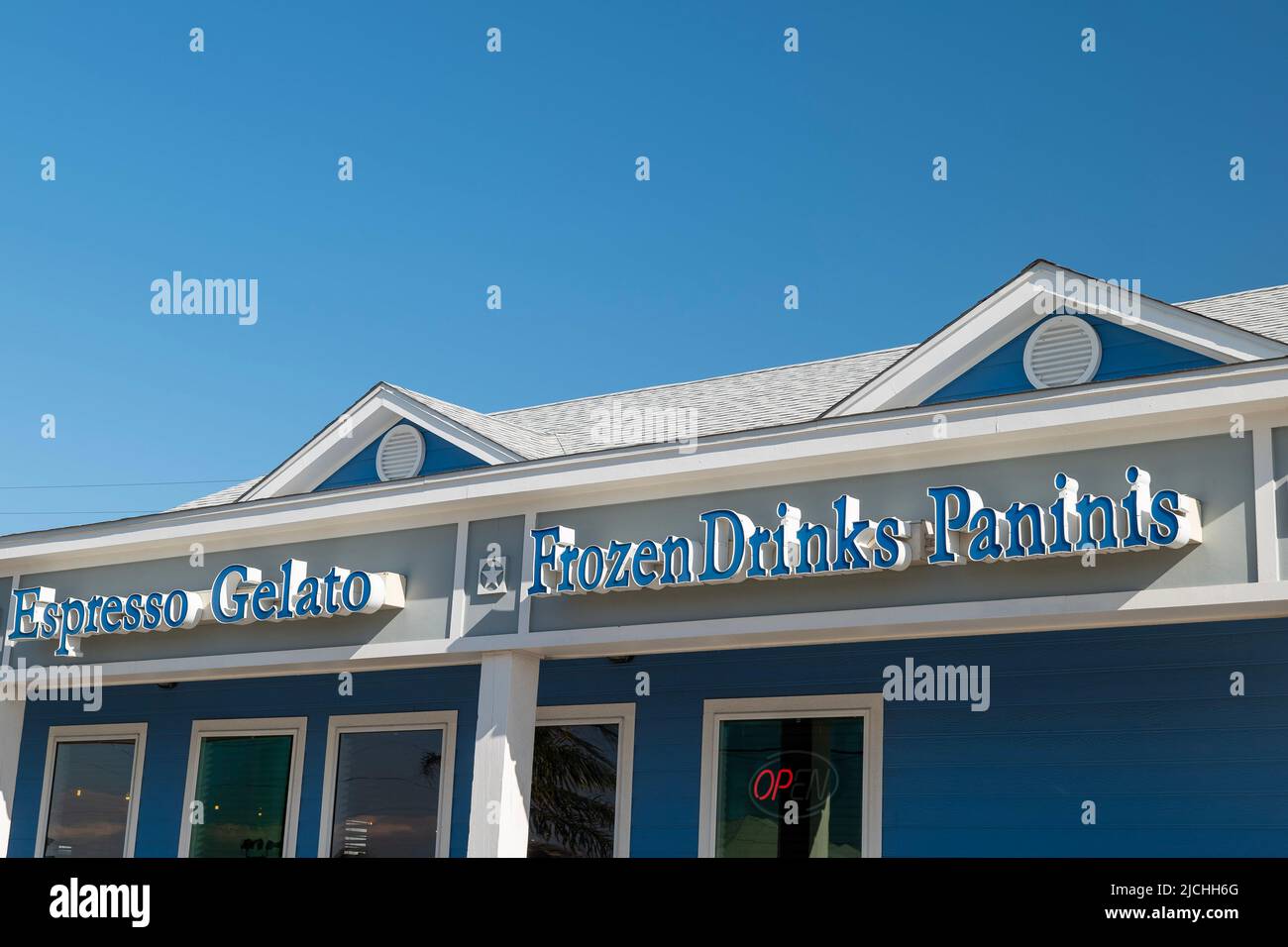 PORT ARANSAS, TX - 25 FEB 2020: Outdoor sign on exterior wall of coffee ...