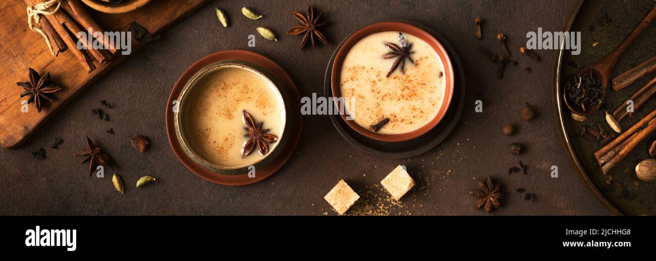 Masala Chai Tea in ceramic cup with ingredients. Traditional indian ...