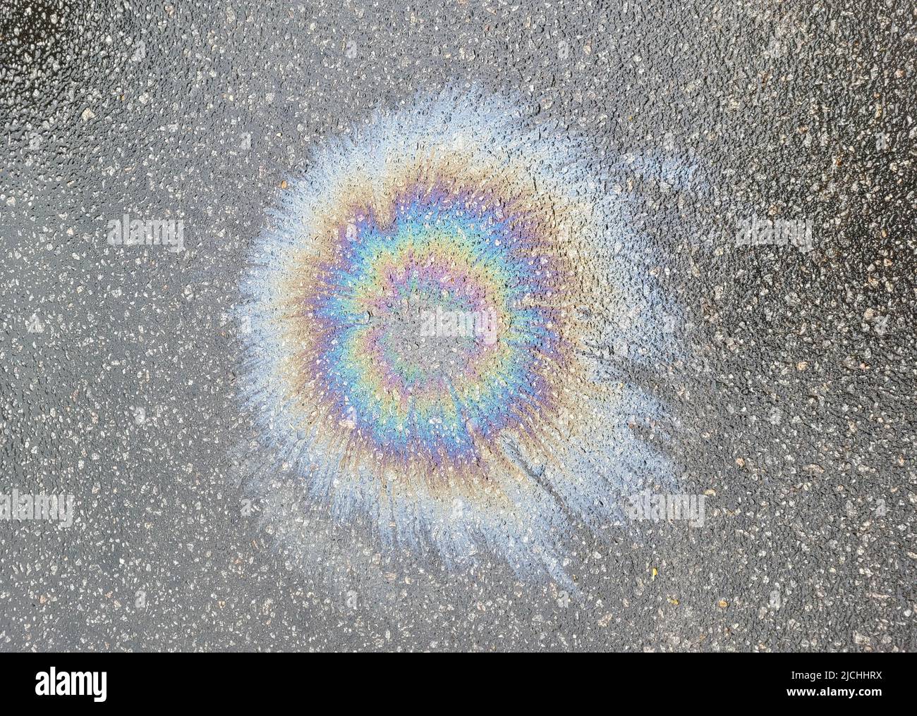 Oil rainbow in puddle hi-res stock photography and images - Alamy
