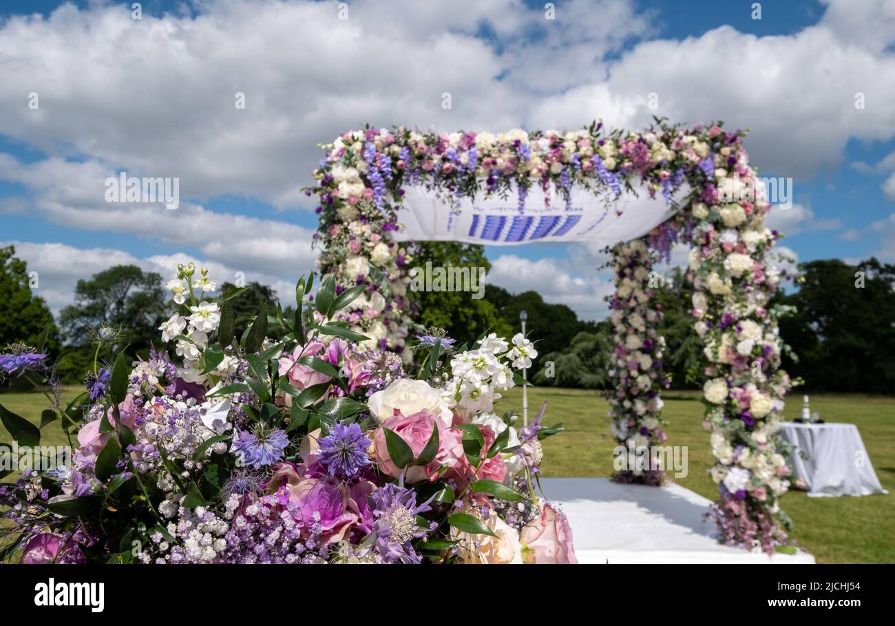 Jewish couple at marriage ceremony under chuppa wedding canopy. Canopy ...