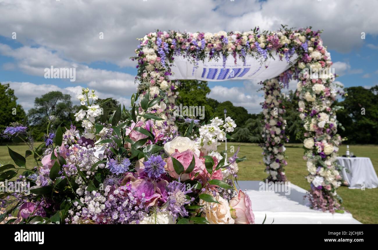 Jewish couple at marriage ceremony under chuppa wedding canopy. Canopy ...