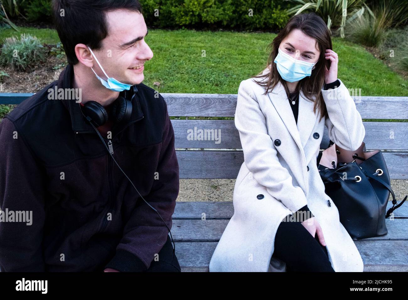 French couple. French people wearing mask to prevent the spread of ...
