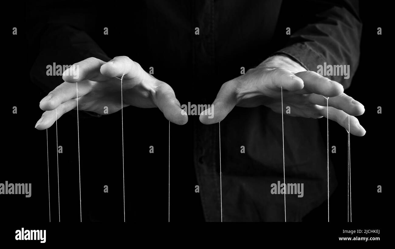 Man hands with strings on fingers. Violence, harassment, bullying ...