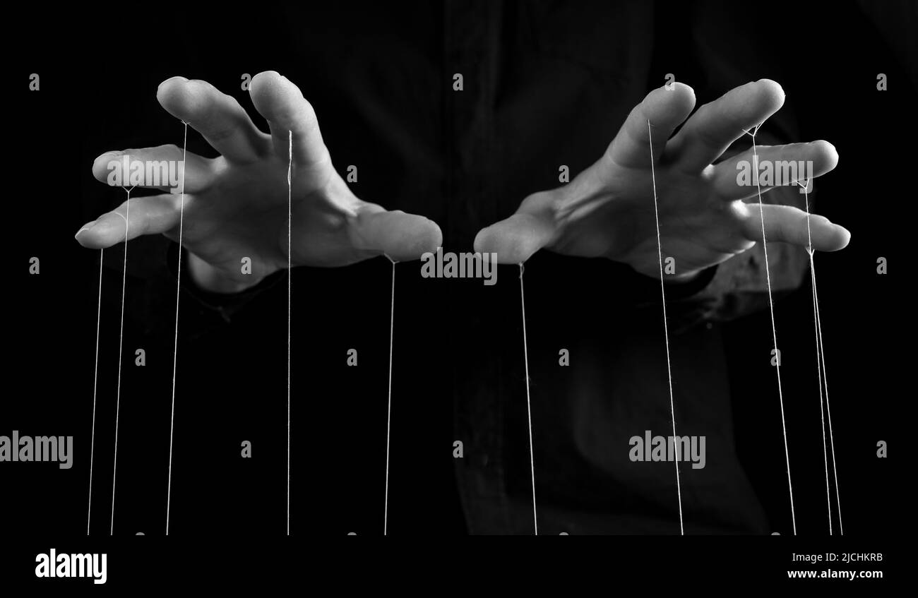 Man hands with strings on fingers. Negative abusive relationship ...