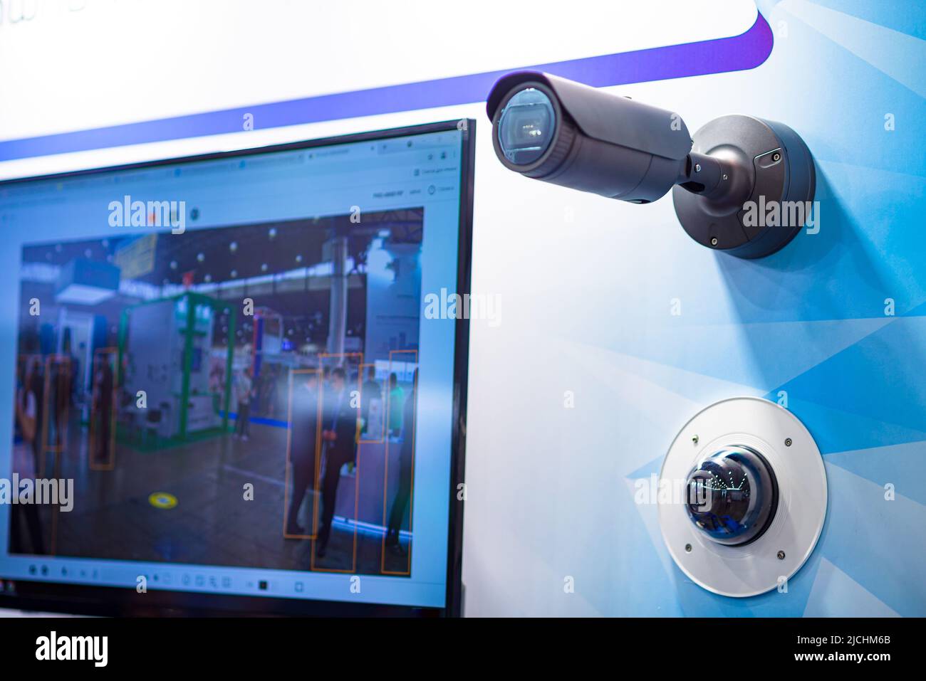 Outdoor surveillance camera with motion sensor Stock Photo - Alamy