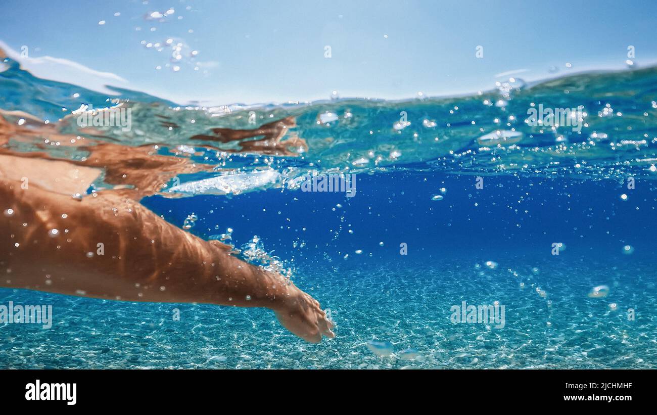 Swimming in the ocean, first person view Stock Photo - Alamy