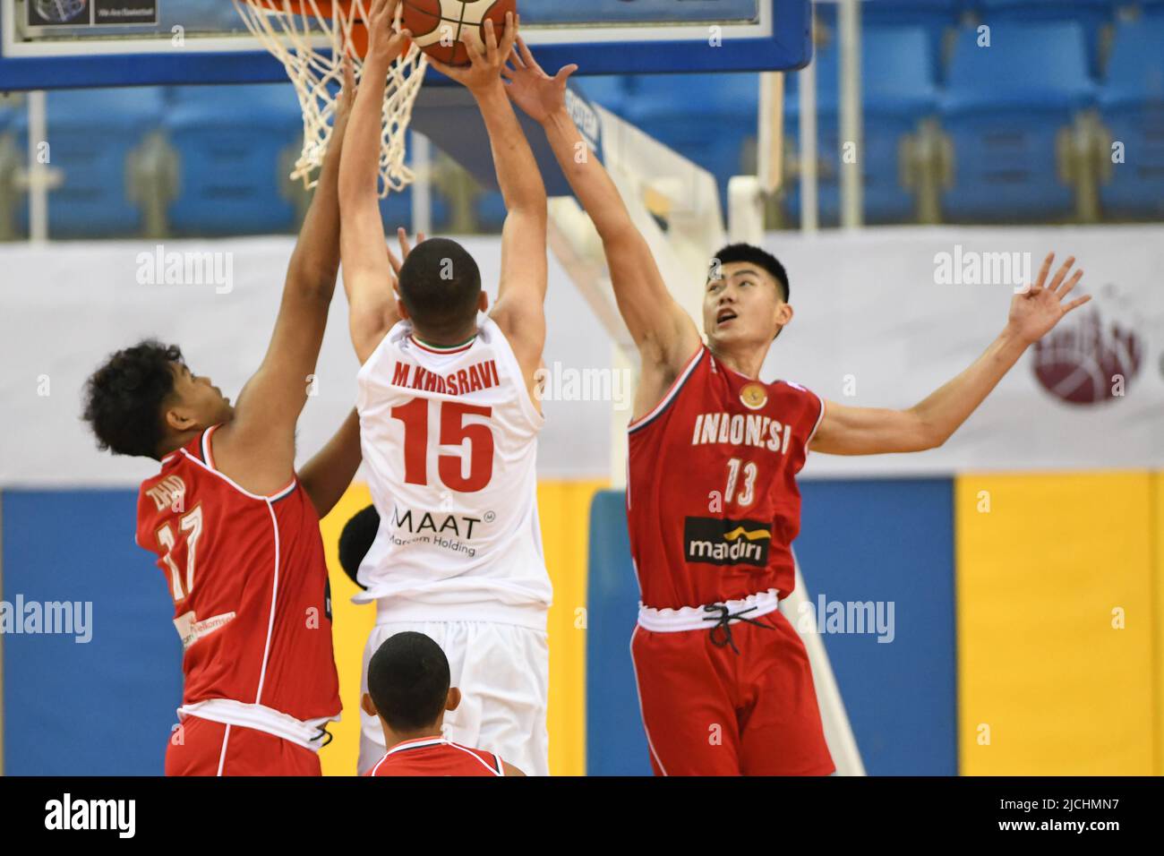 Doha, Qatar. 13th June, 2022. Mohammadamin Khosravi (M) of Iran ...
