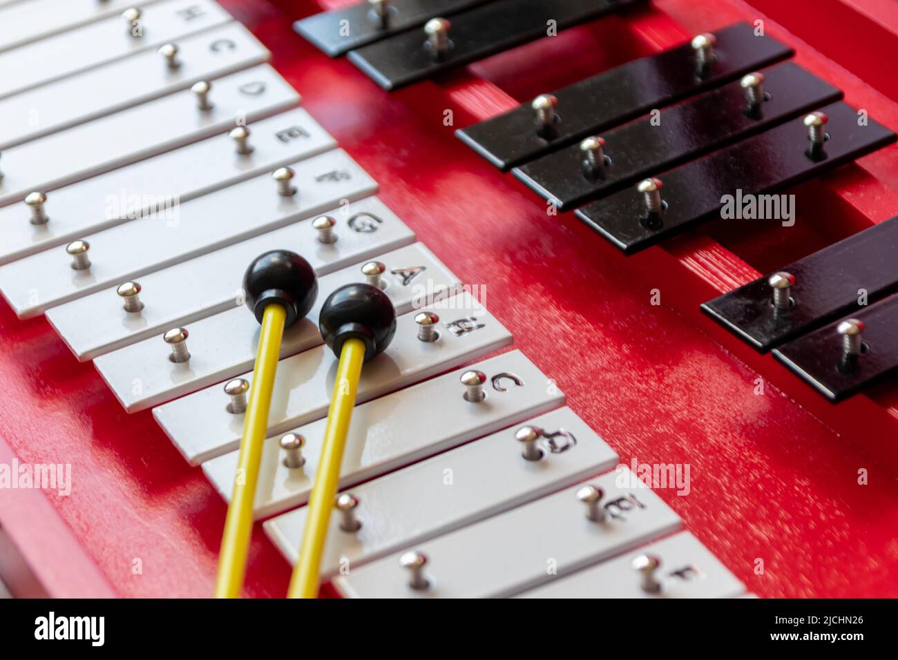 Portable xylophone or sticcado with drum sticks for educational music ...