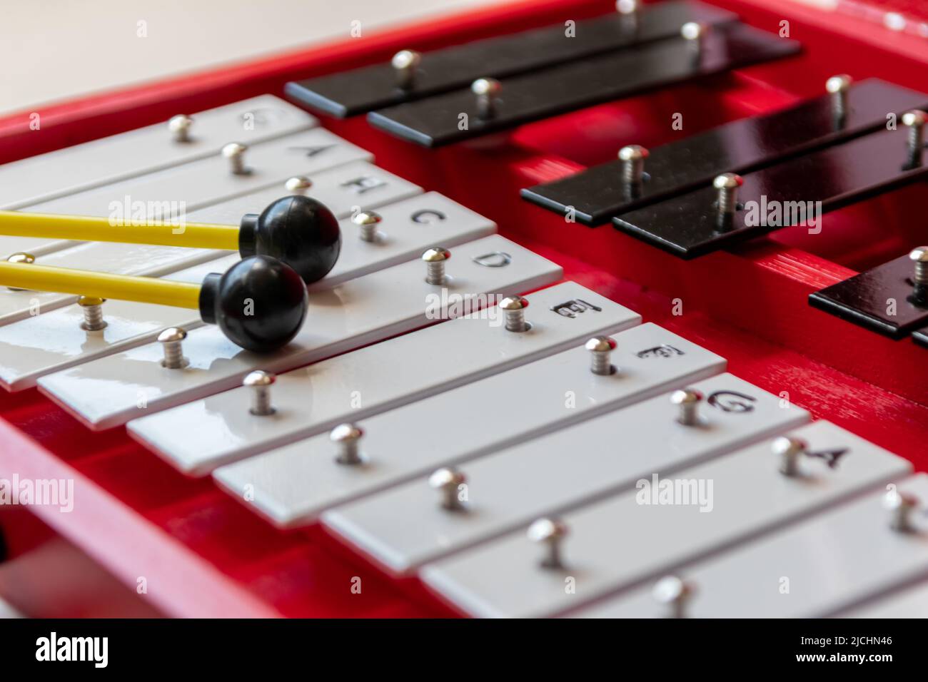 Portable xylophone or sticcado with drum sticks for educational music ...