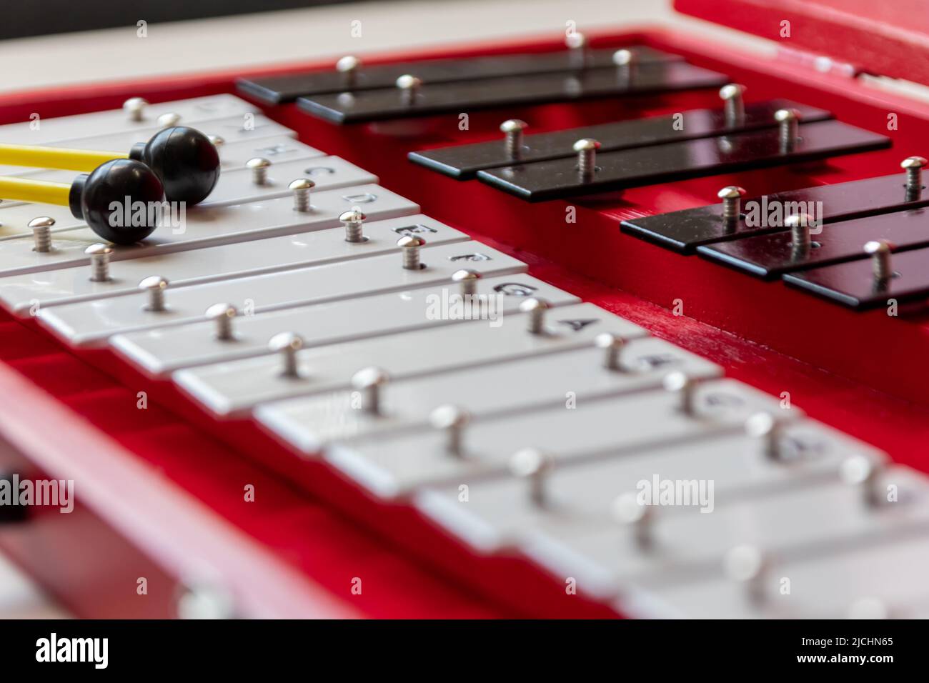 Portable xylophone or sticcado with drum sticks for educational music ...