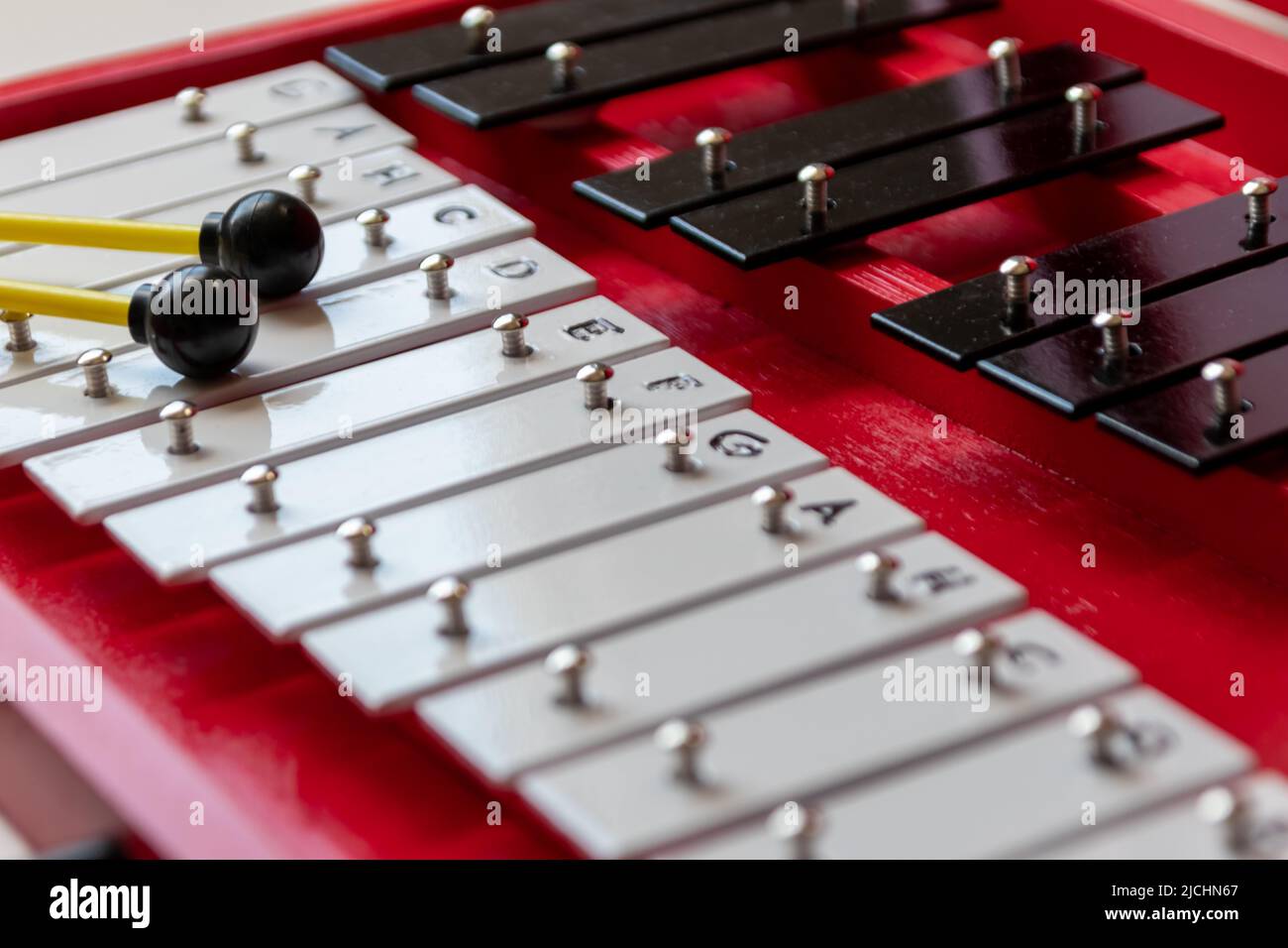Portable xylophone or sticcado with drum sticks for educational music ...