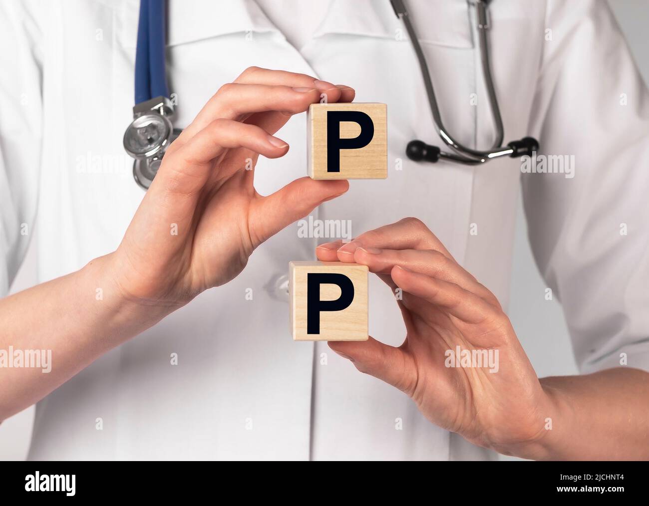 PP vitamin, word acronym on cubes in hands. High quality photo Stock ...