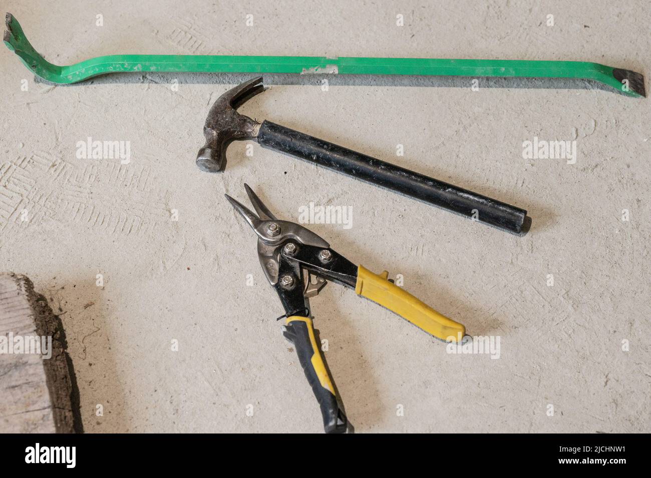 Scissors for cutting metal and metal building elements, hammer and ...