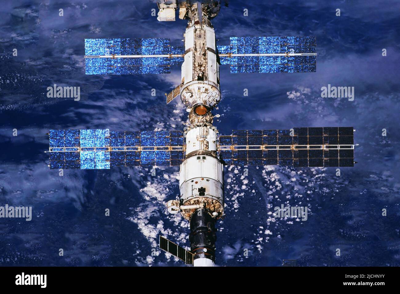 Iss over the planet Earth. Elements of this image furnished by NASA ...