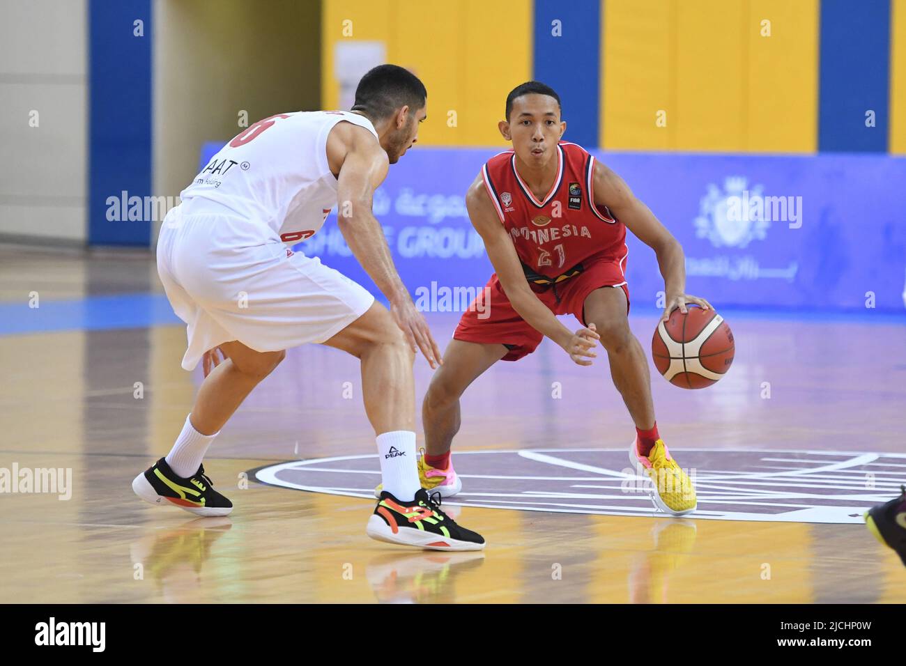 Mohammad Amini (L) of Iran Basketball team and Andante Daud Alghifari of Indonesia Basketball ...