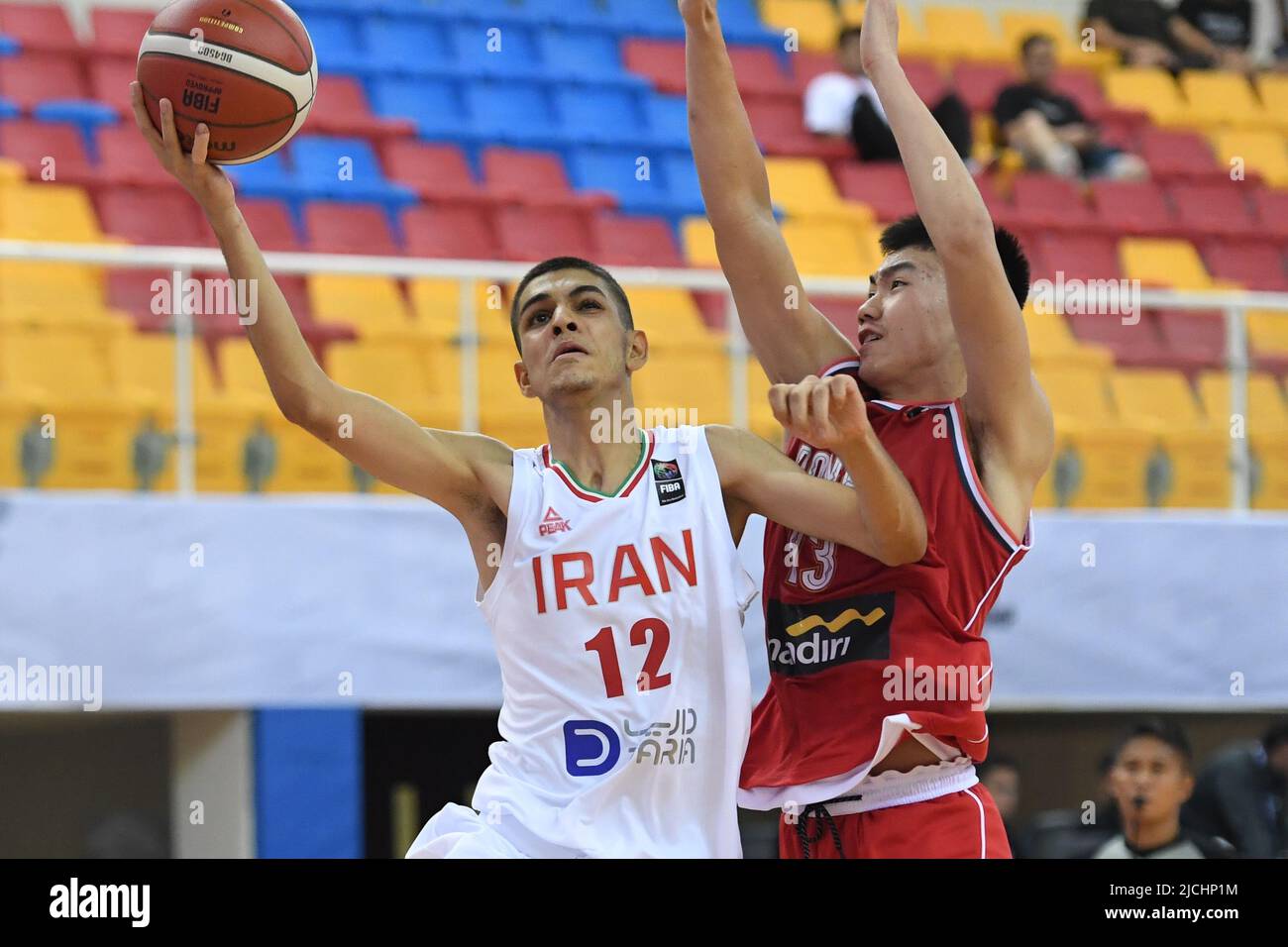 Doha, Qatar. 13th June, 2022. Mojtaba Yaghoubi (L) of Iran Basketball ...