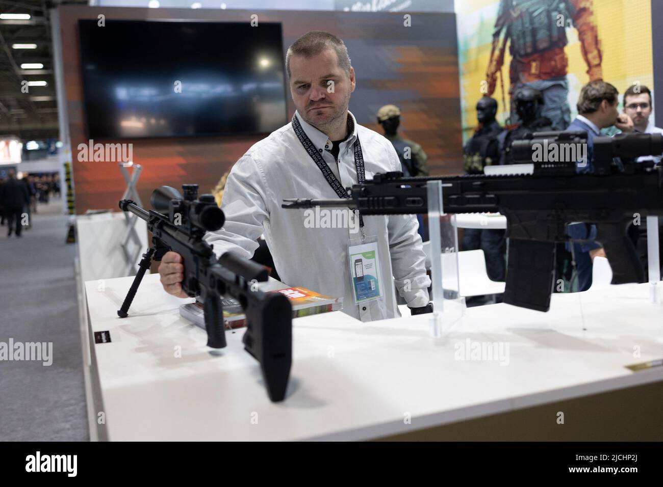 Paris, France, June 13, 2022. A visitor holds a weapon at the ...