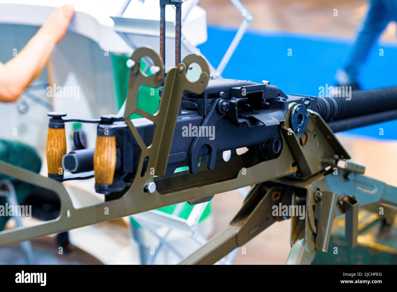 Heavy machine gun with two handles for holding and firing Stock Photo ...