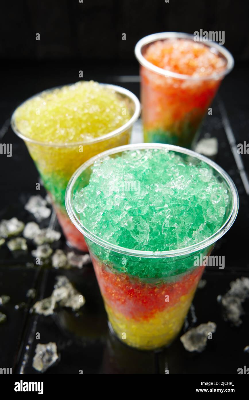 Assorted fresh Slush drinks in plastic glasses Stock Photo - Alamy