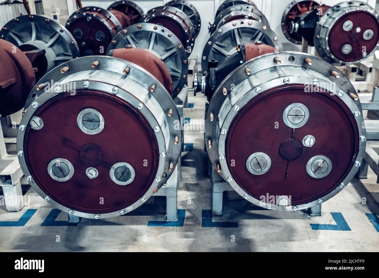 Close up disassembled tractor reduction axle on modern tractor at ...