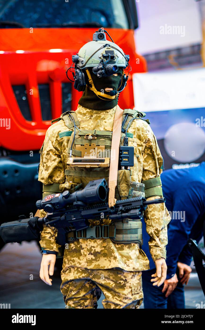 Modern military uniform with weapons Stock Photo - Alamy