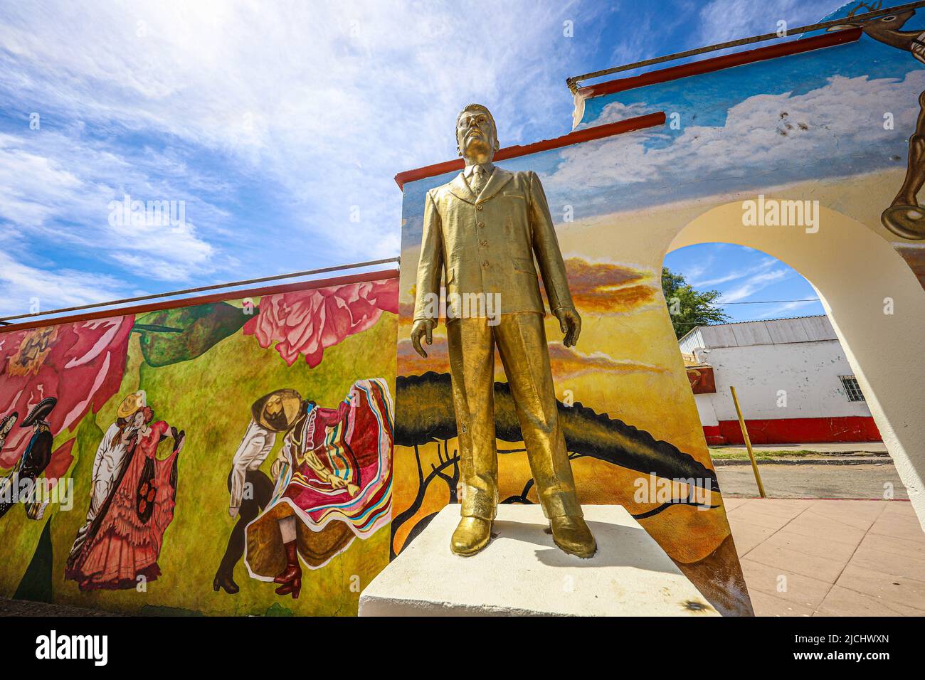 Statue or monument and mural in the public square in Esqueda, Mexico ...