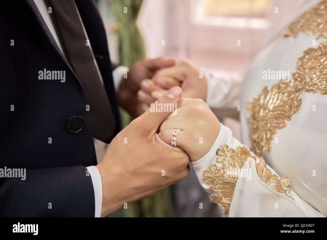 National wedding. Bride and groom. Wedding muslim couple during the marriage ceremony. Muslim ...