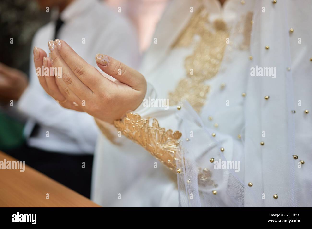 National wedding. Bride and groom. Wedding muslim couple during the marriage ceremony. Muslim ...