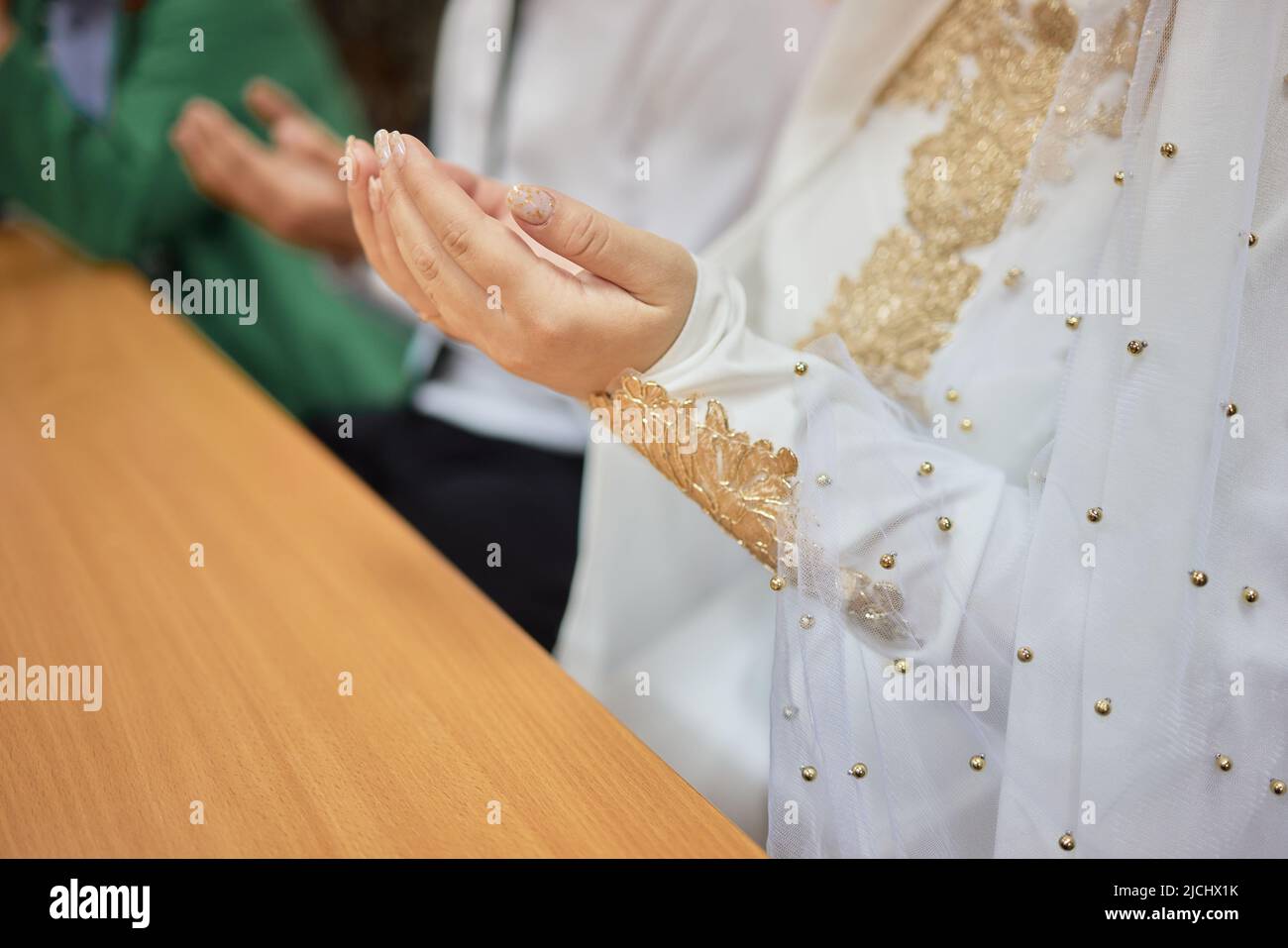 National wedding. Bride and groom. Wedding muslim couple during the marriage ceremony. Muslim ...