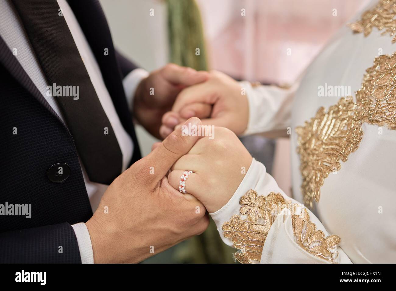 National wedding. Bride and groom. Wedding muslim couple during the marriage ceremony. Muslim ...
